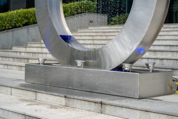 Outdoor circular water spray sculpture - Metal Sculpture Specialist