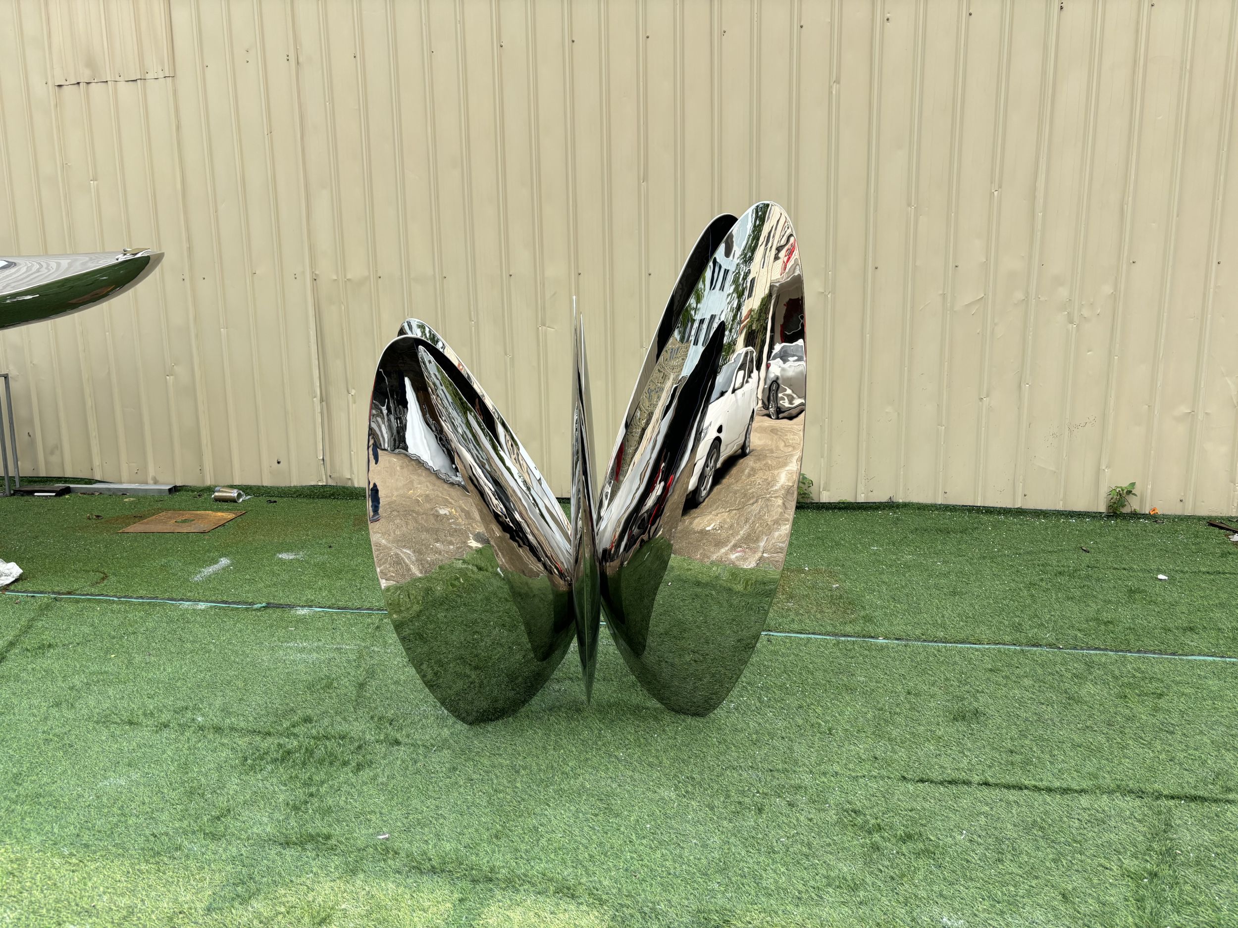 The poetry of shells: stainless steel shell sculpture - Metal Sculpture ...